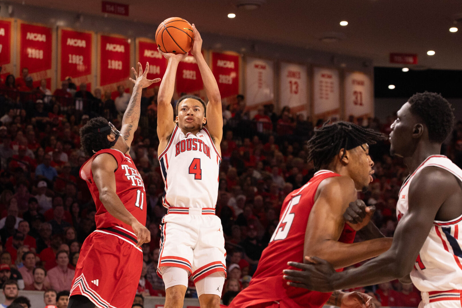 A top 15 matchup: No.7 Houston defeats No.14 Texas Tech in a close game ...